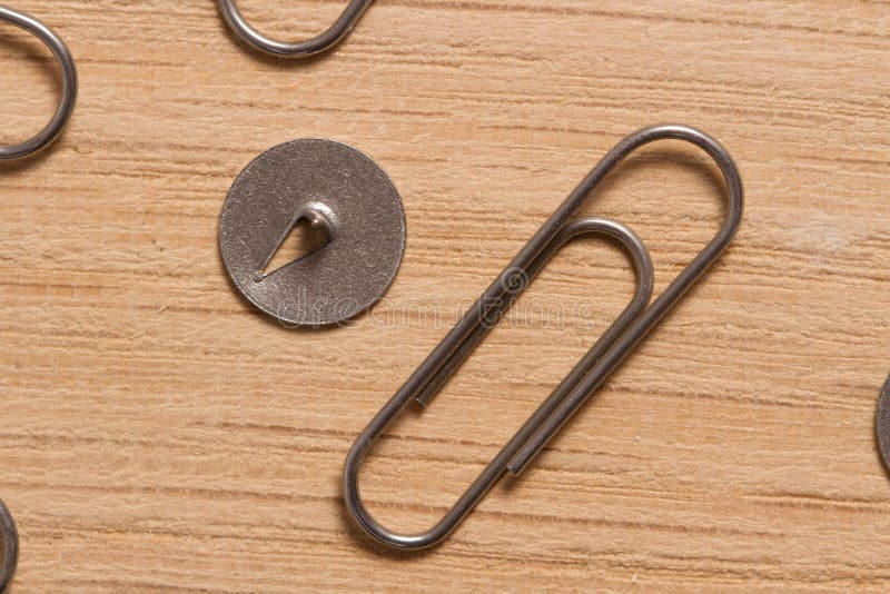 Buttons and Paper Clips on a Wooden Surface. Workshop Scale Models ...