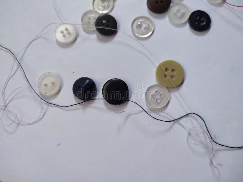 Buttons and Sewing Thread on White Background Stock Image - Image of ...