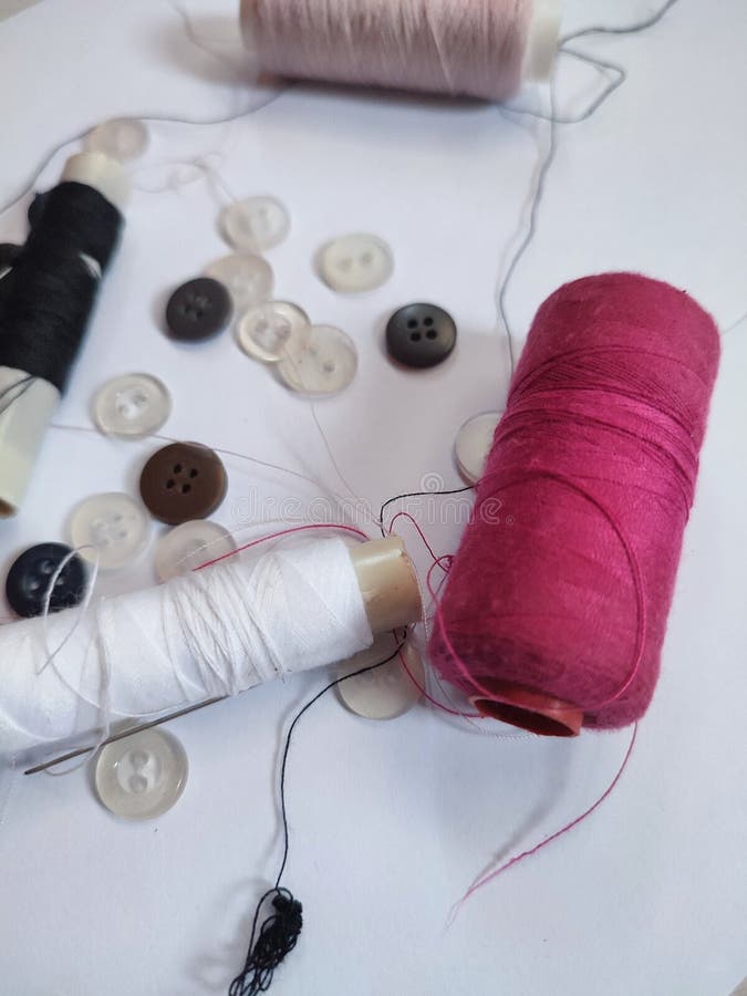 Buttons and Sewing Thread on White Background Stock Photo - Image of ...