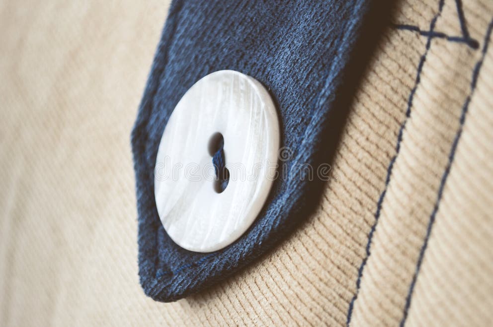 Buttons sewn on fabric stock image. Image of homemade - 78691947