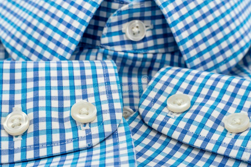 Buttons on the Sleeve of the Shirt in Blue Checkered Material. Button ...
