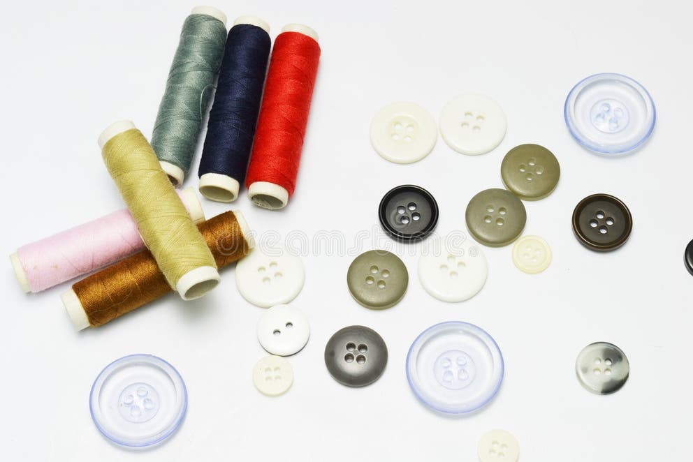 Buttons and thread stock photo. Image of dress, buttons - 61743718