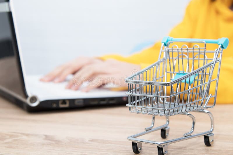 Buy cart with computer stock photo. Image of home, commerce - 152159900