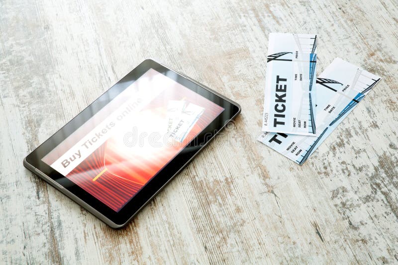 Buy Cinema Tickets Online with a Tablet PC Stock Photo - Image of ...