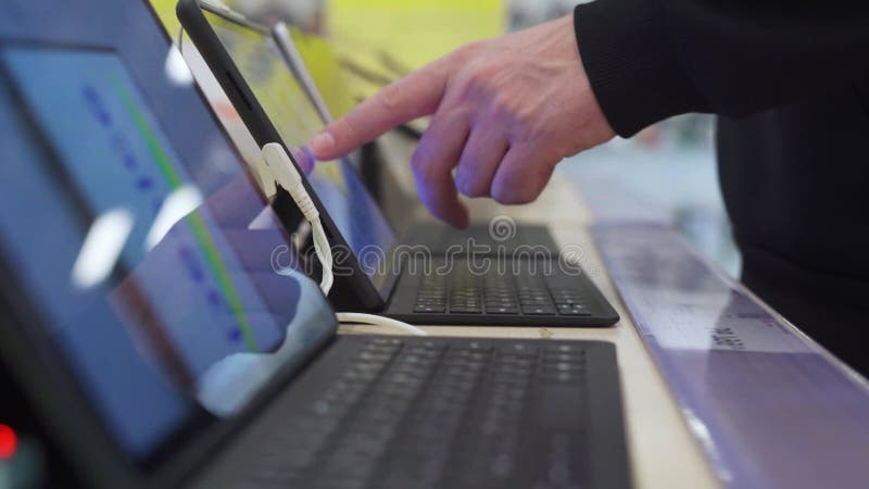 Buyer Checking Laptops in a Computer Store Stock Footage - Video of ...