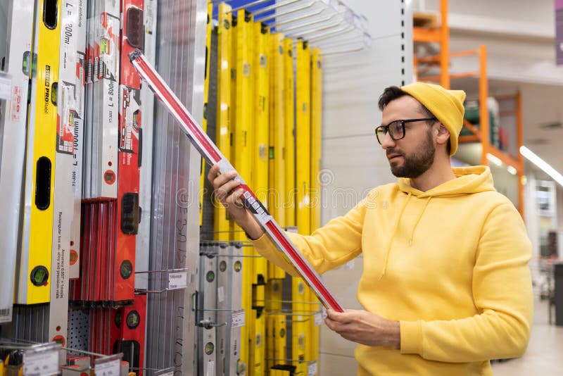 The Buyer Chooses the Building Level in the Building Equipment Store ...
