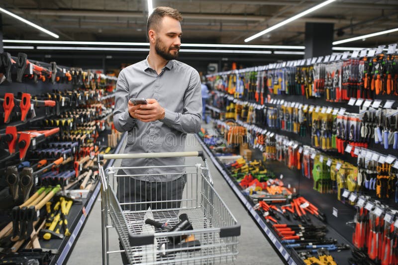 A Buyer in a Hardware Store, Concept Home Renovation Stock Photo ...