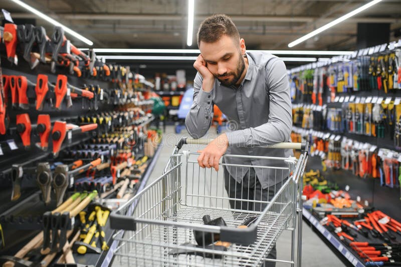 A Buyer in a Hardware Store, Concept Home Renovation Stock Photo ...