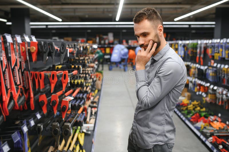 A Buyer in a Hardware Store, Concept Home Renovation Stock Photo ...