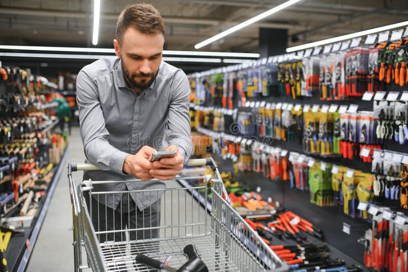 A Buyer in a Hardware Store, Concept Home Renovation Stock Photo ...
