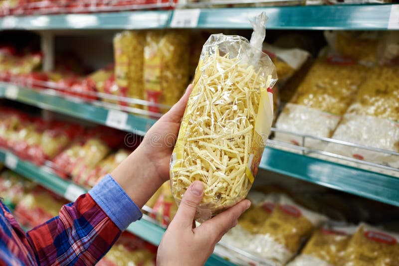 Buyer with Package Pasta in Shop Stock Photo - Image of shopper ...
