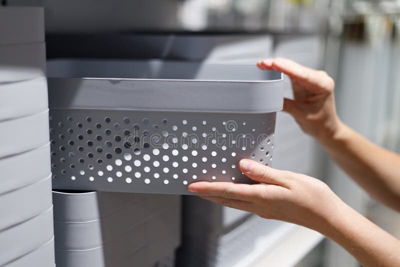 Buying Plastic Storage Containers in the Store Stock Photo - Image of ...