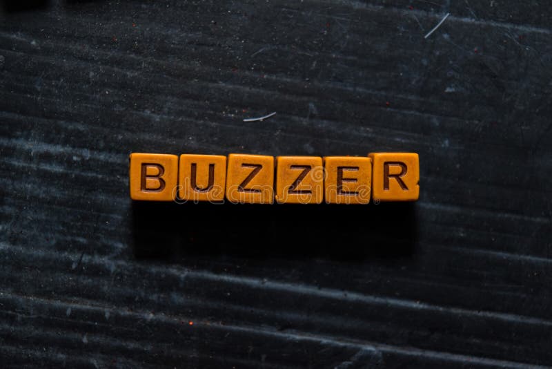 Buzzer on Wooden Cubes. on Table Background Stock Photo - Image of ...