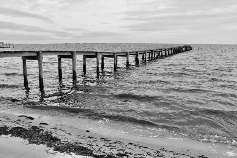 Cloudy Day Lingering Over the Pier in Carrabelle Florida Stock Photo ...