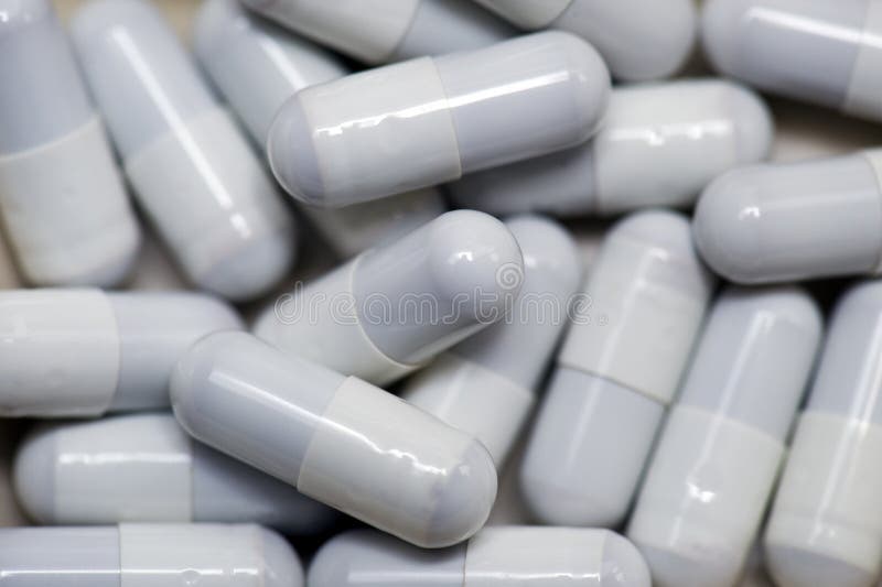Cápsulas grises foto de archivo. Imagen de vitamina, apego - 27672892