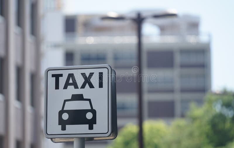 Cab stand stock photo. Image of signs, building, text - 222948256