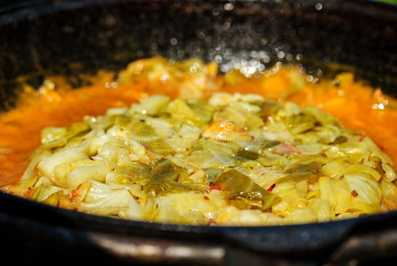 Cabbage is Cooked in Cauldron on Fire. Stock Photo - Image of national ...