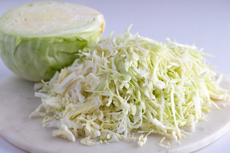 Cut Fresh Cabbage on White Background Stock Photo - Image of table ...