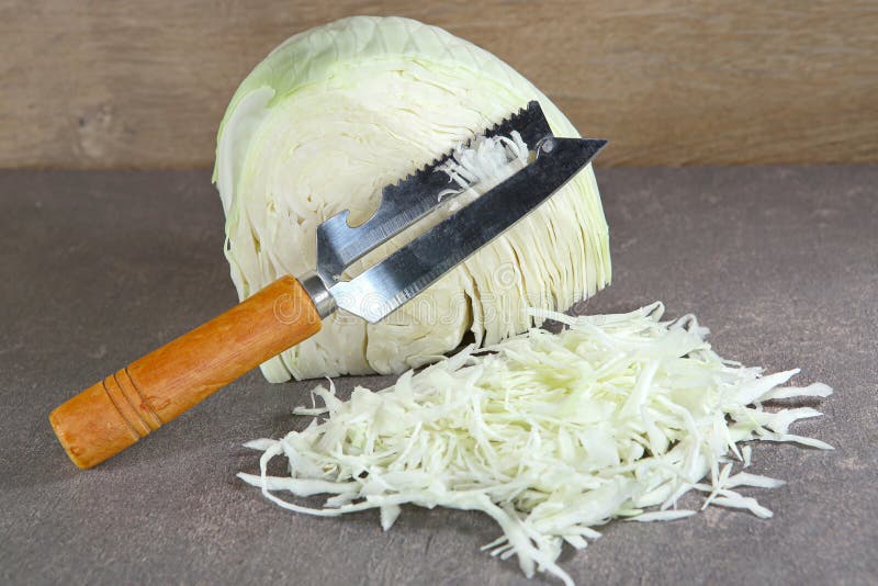 Cabbage Slicer and Multifunctional Knife Chopping Cabbage. Stock Image ...