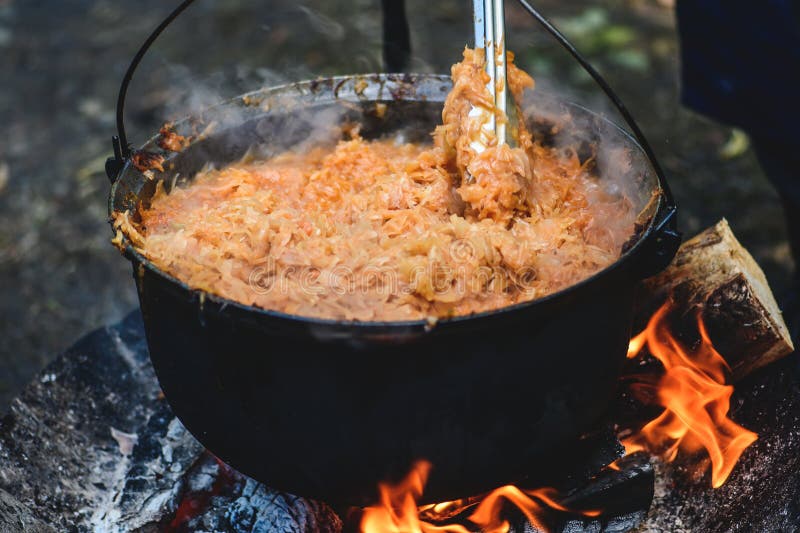 Cabbage Soup or Stew Cooking in a Big Pot on the Open Fire Stock Image ...