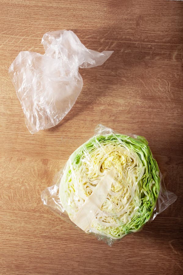 Cabbage Vegetable in Plastic Bag. Single Use Plastic Packaging Issue ...