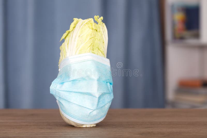 Cabbage Wearing a Mask on Table Stock Photo - Image of tags, wearing ...