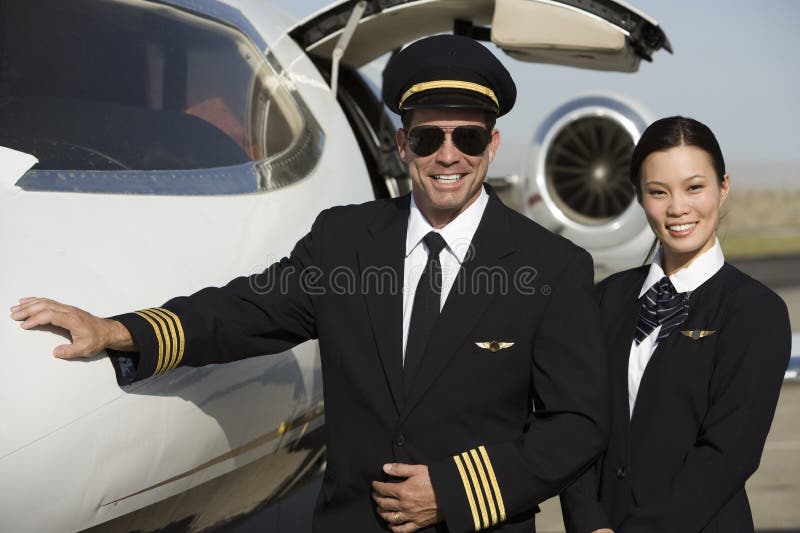Cabin Crew Members by an Aircraft Stock Image - Image of korean ...