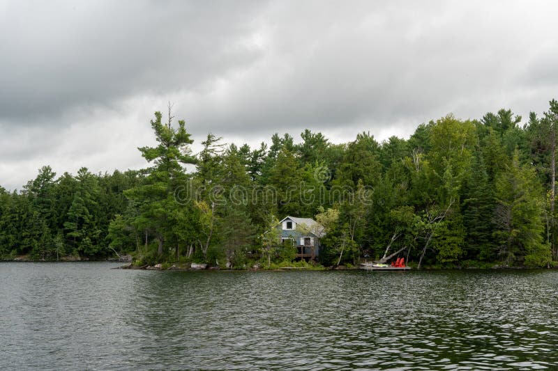 A Cabin in the Forest by a Lake Stock Image - Image of europe, green ...
