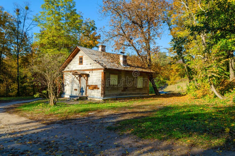 Cabin in the Forest at Sunset. Autumn Landscape Stock Image - Image of ...