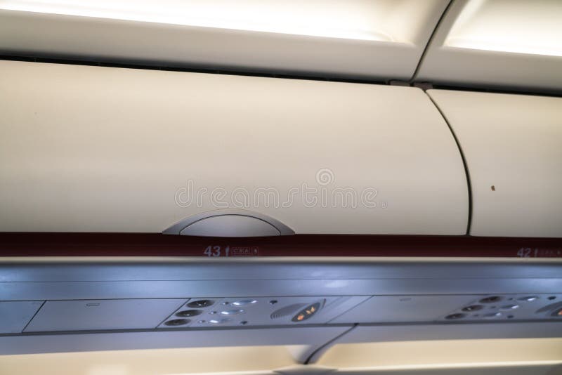 Cabin Inside the Aircraft, Lights, Air Condition and Signs Panel Above ...