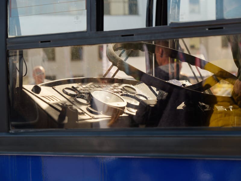Cabin of a Large Bus. Driver`s Seat Behind the Car Glass Stock Photo ...