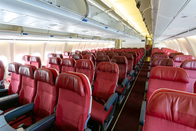 Red seating in aircraft stock image. Image of neck, hospitality - 99031811