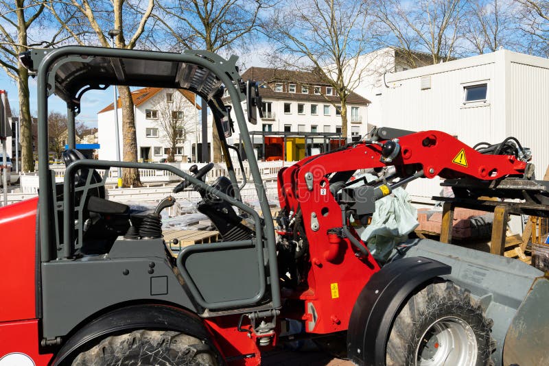 Cabin of a Red Tractor at a Construction Site. Stock Photo - Image of ...