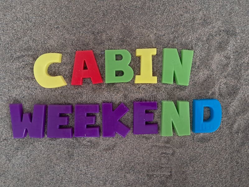Cabin Weekend Message Written on Sand Stock Photo - Image of ...