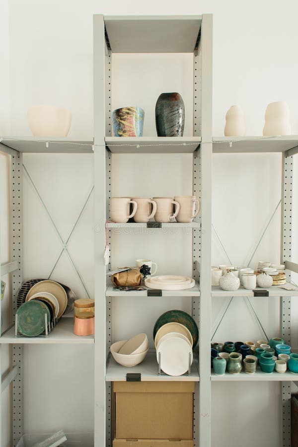 Cabinet with Ceramic Dishes in the Studio Stock Image - Image of ...