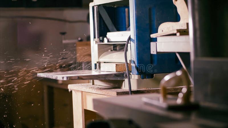 Cabinet Planer Machine is Working with Sawdust at Wood Workshop Stock ...