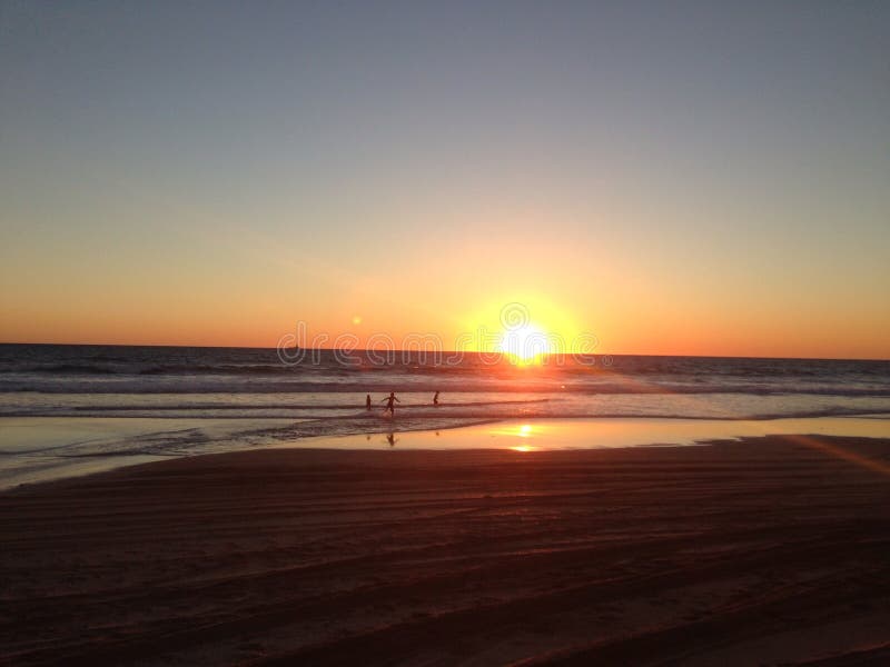 Cable beach sunset stock photo. Image of dusk, ocean - 42557384
