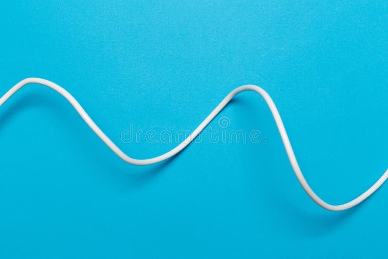 Cable on a blue background stock image. Image of electronic - 140091699
