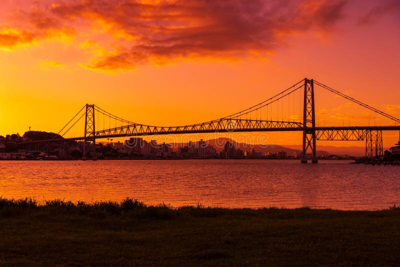 Cable Bridge with Sunset Sky and Reflection on Water in Florianopolis ...