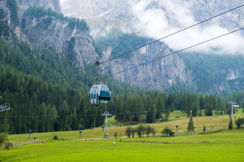 Cable Car Cabins Against Amazing Dolomites Alp Covered with Clouds ...