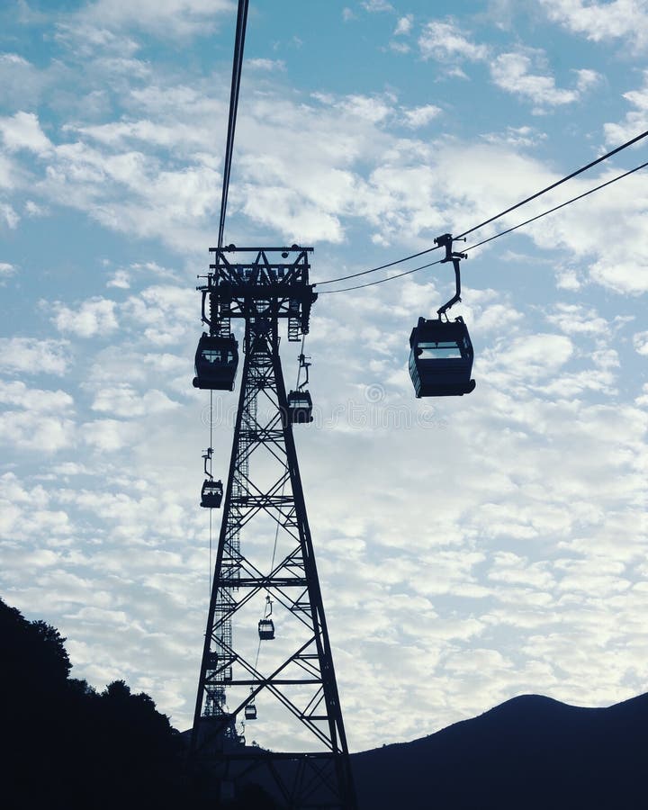 Cable Car with Clouds, Sky and Mountains View Stock Image - Image of ...