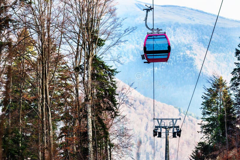 Cable Car Going Up To the Top of the Mountain Over the Clouds Stock ...