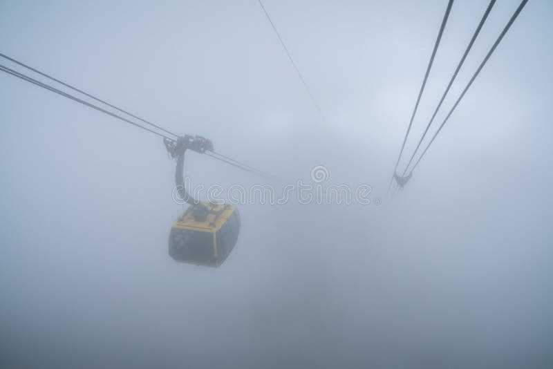 The Cable Car To Mountain Top with Mist Stock Photo - Image of cloud ...