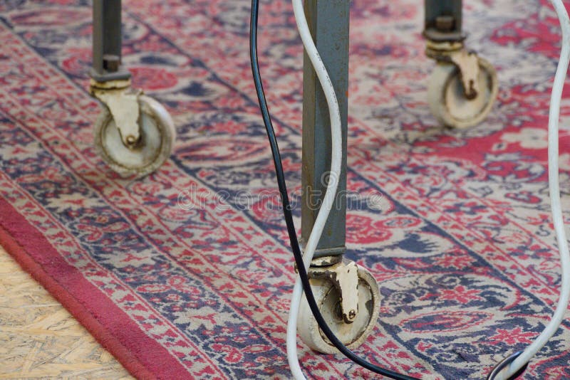 Cable on a Carpet Under a Wheel Table Stock Image - Image of cable ...