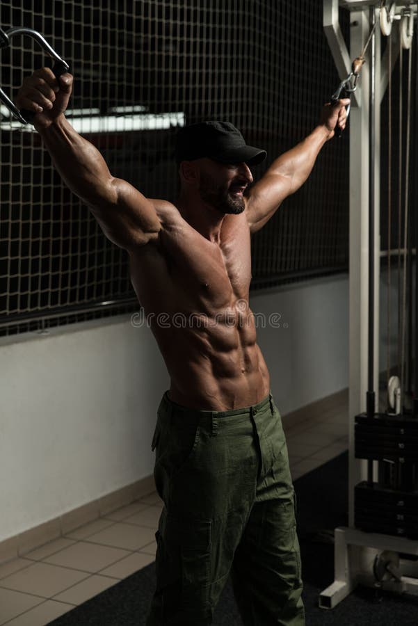Cable Crossover Chest Workout Stock Image - Image of bald, lifestyle ...