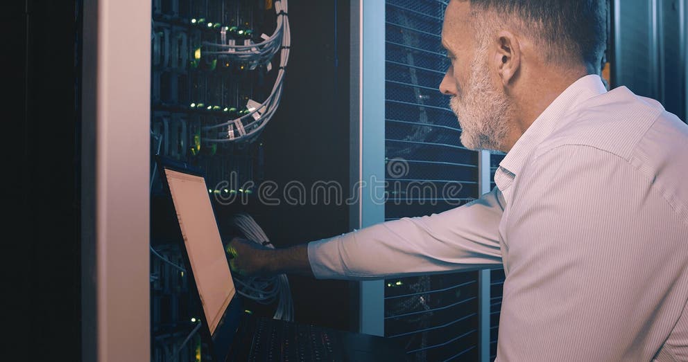 Cable, Laptop and Technician Man in Server Room for Cyber Security ...