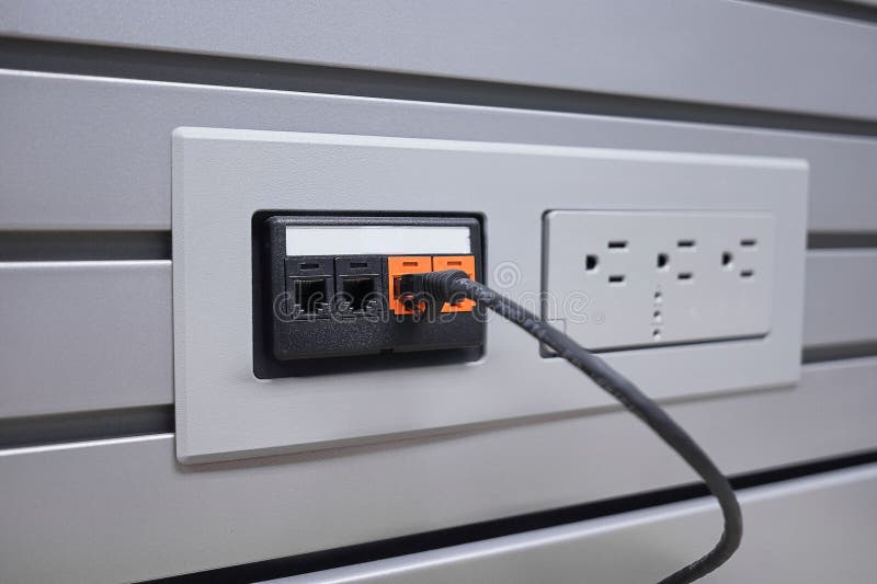 Cable Plugged into Wall Socket Stock Image - Image of office, digital ...