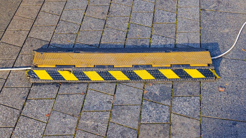 Cable Protector Street Pavement Stock Image - Image of city, protect ...