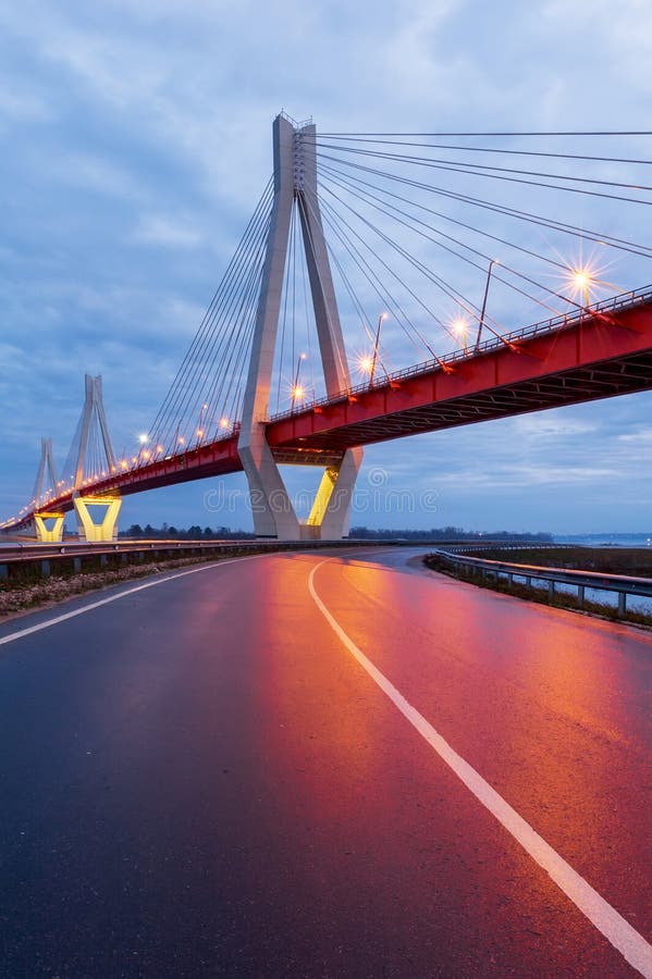 Cable-stayed Bridge at Sunset Against a Beautiful Sky and in the Rays ...