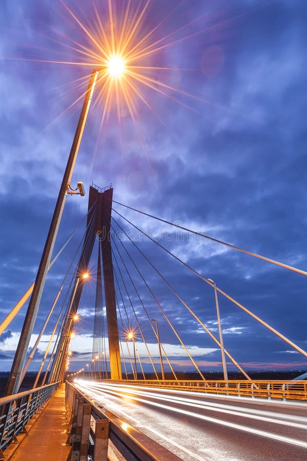 Cable-stayed Bridge at Sunset Against a Beautiful Sky and in the Rays ...
